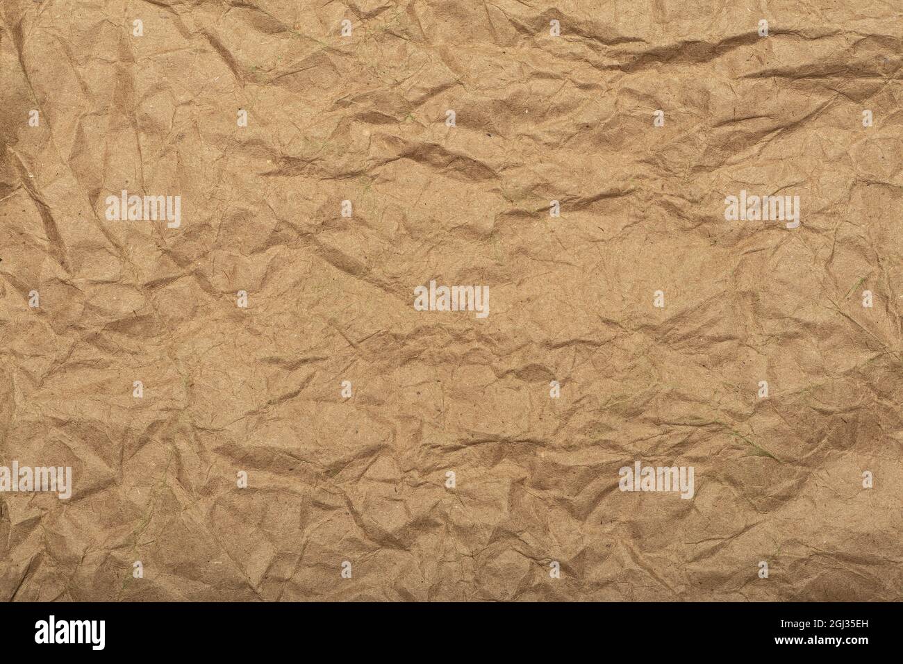 Crafted recycled paper with texture and wrinkled effect. Crumpled paper ...