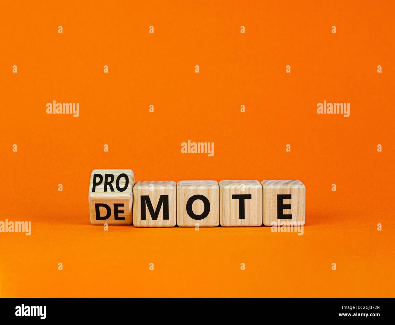 Promote or demote symbol. Turned a cube and changed the word 'demote ...