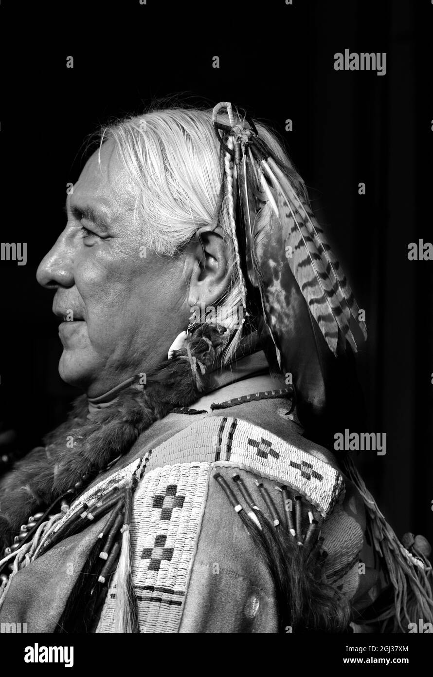 Native American painter Monte Yellowbird Sr. sits in his booth at the ...