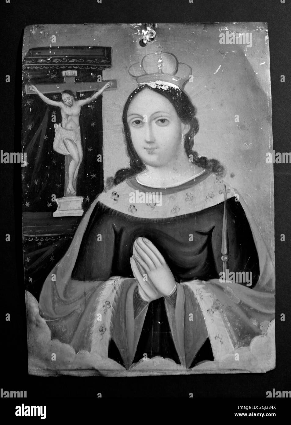 An antique hispanic or Spanish retablo with a portrait of the Virgin ...