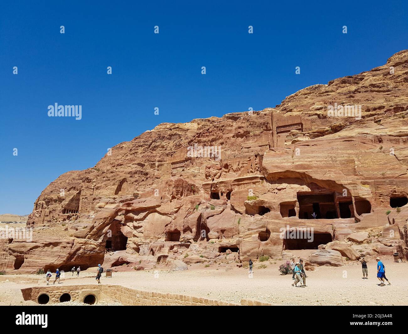 Historic caves of Petra, Jordan Stock Photo - Alamy