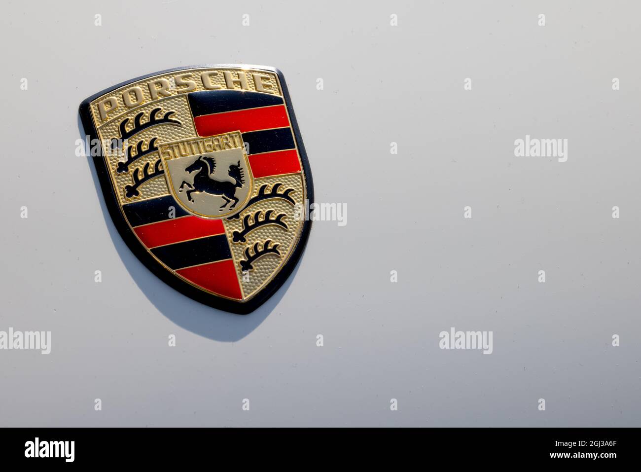 Porsche bonnet badge on display at the Concours d'Elegance held at ...