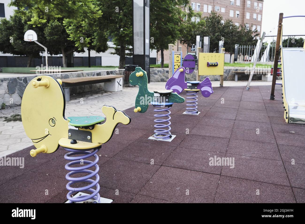 Row of spring rockers in different shapes in a playground Stock Photo ...