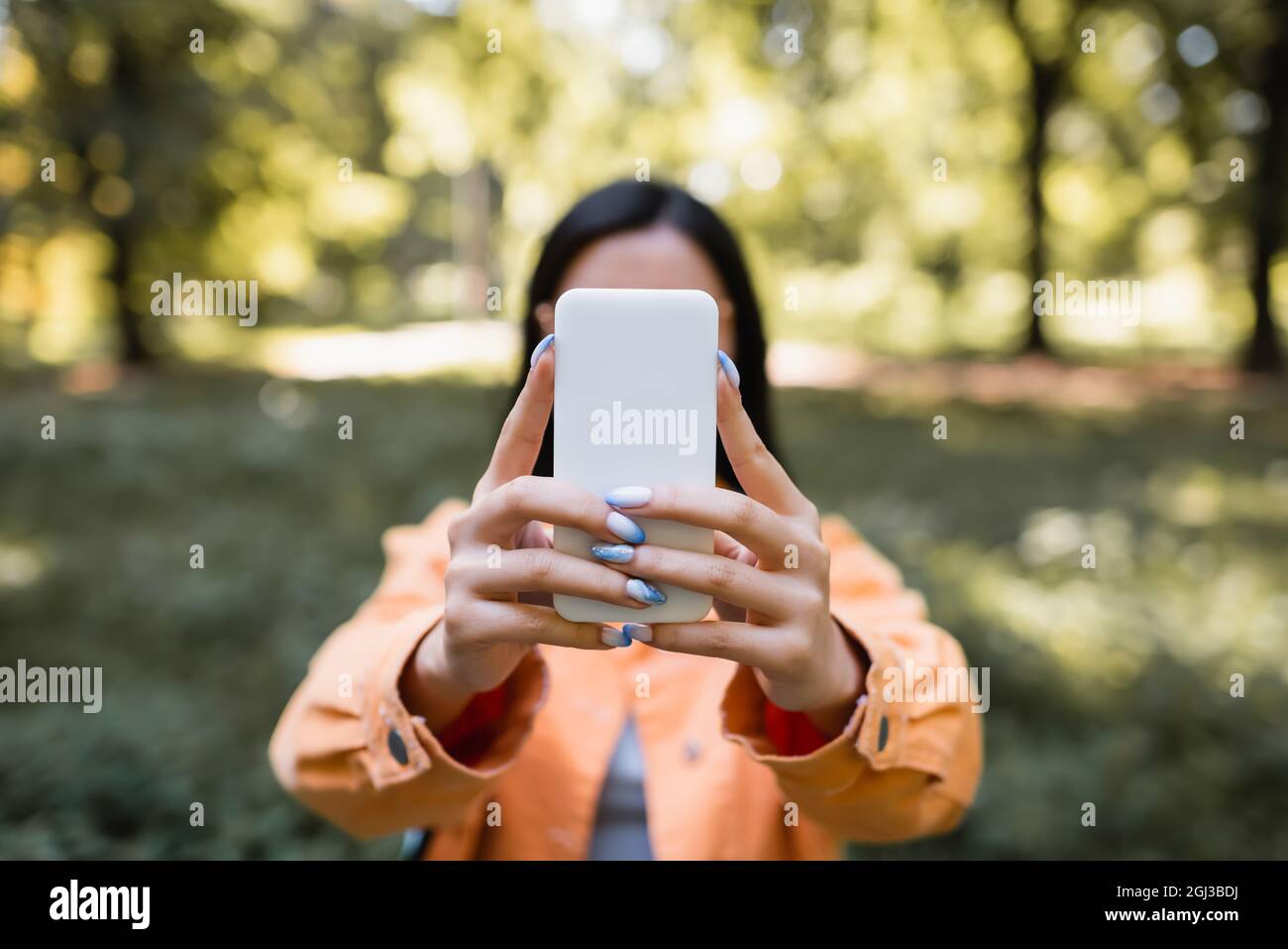 Blurred woman taking selfie hi-res stock photography and images - Alamy
