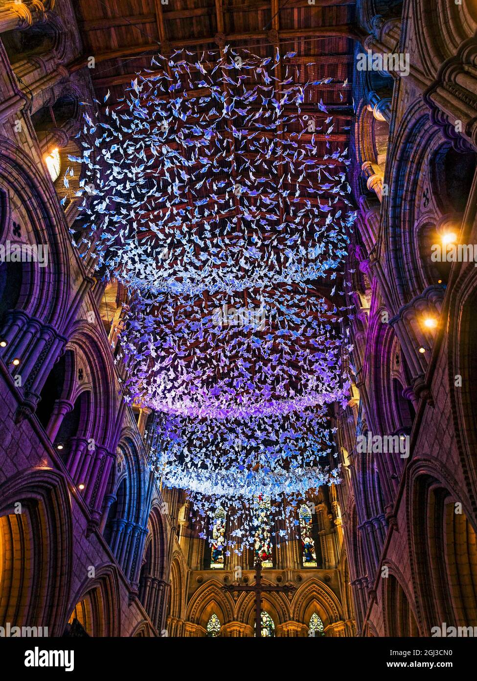 Hexham Abbey interior with an ariel installation of origami angels in ...