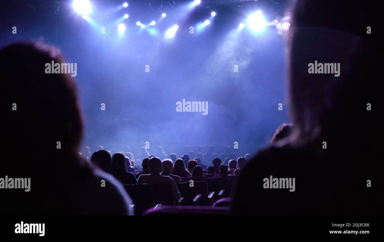 Group of happy people enjoying a rock concert Stock Photo - Alamy