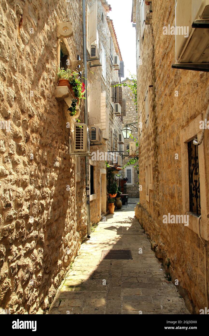 Street in the old town Budva and the Citadel, Budva municipality ...