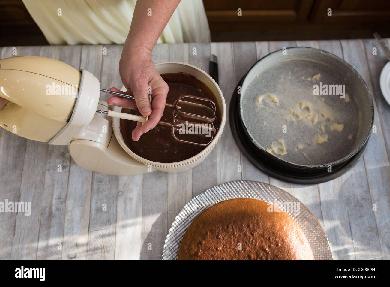 Cake making process. The dough is ready. The mixer beaters are stopped ...