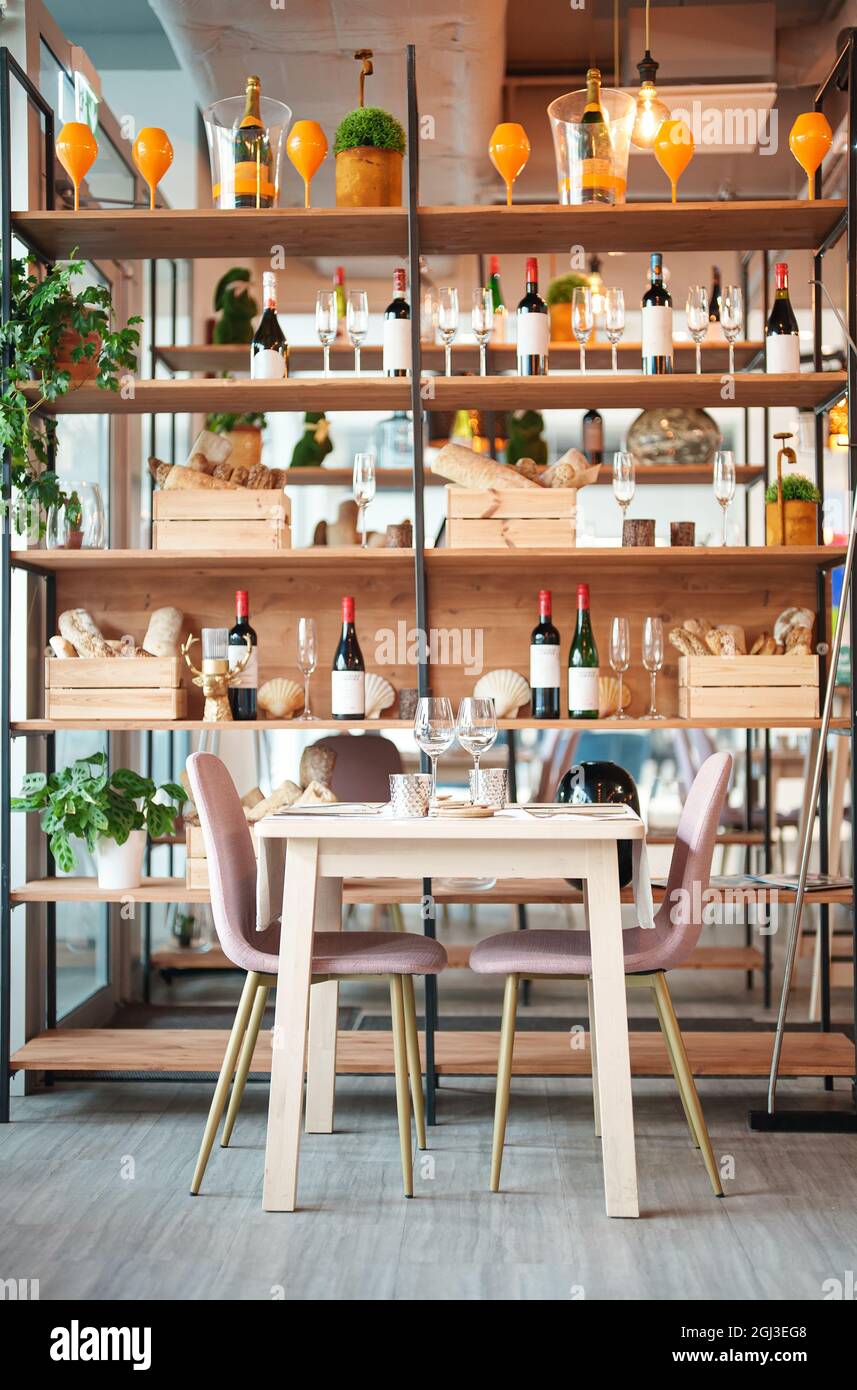 Laid table in a beautiful interior restaurant Stock Photo - Alamy
