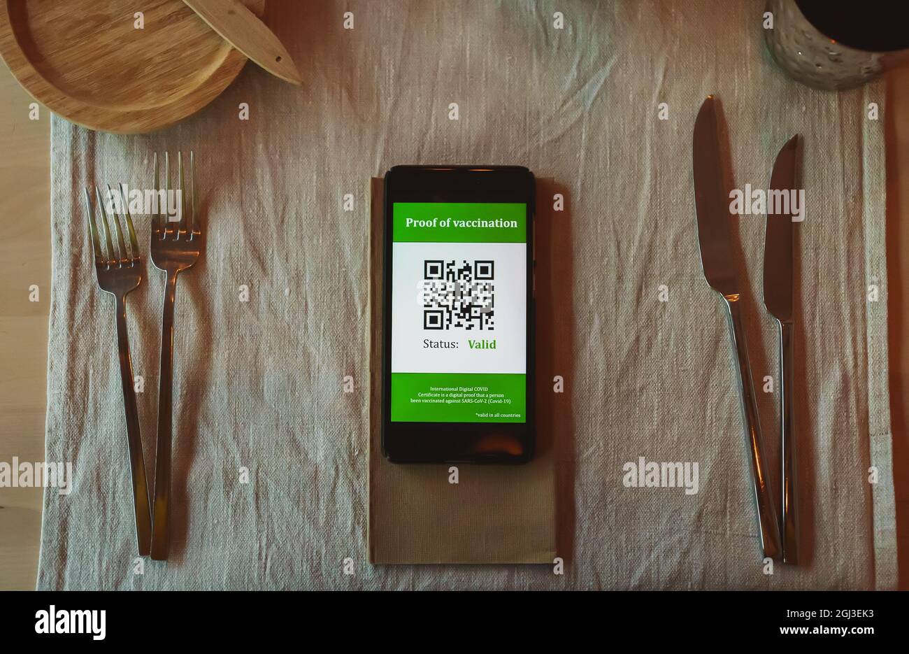 Smartphone app with certificate of immunization in restaurant. Status ...