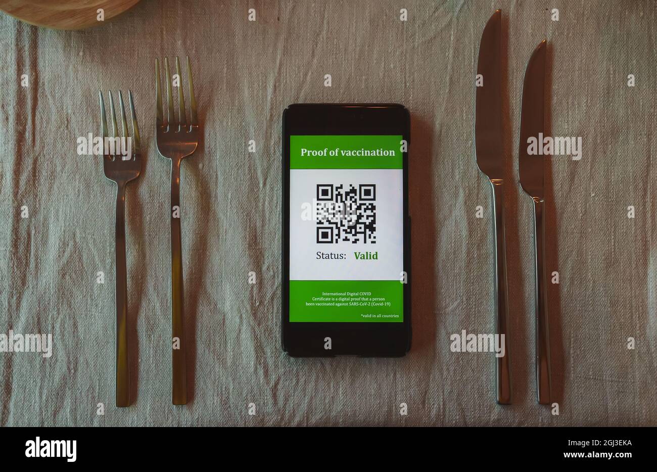 Smartphone app with certificate of immunization in restaurant. Status ...
