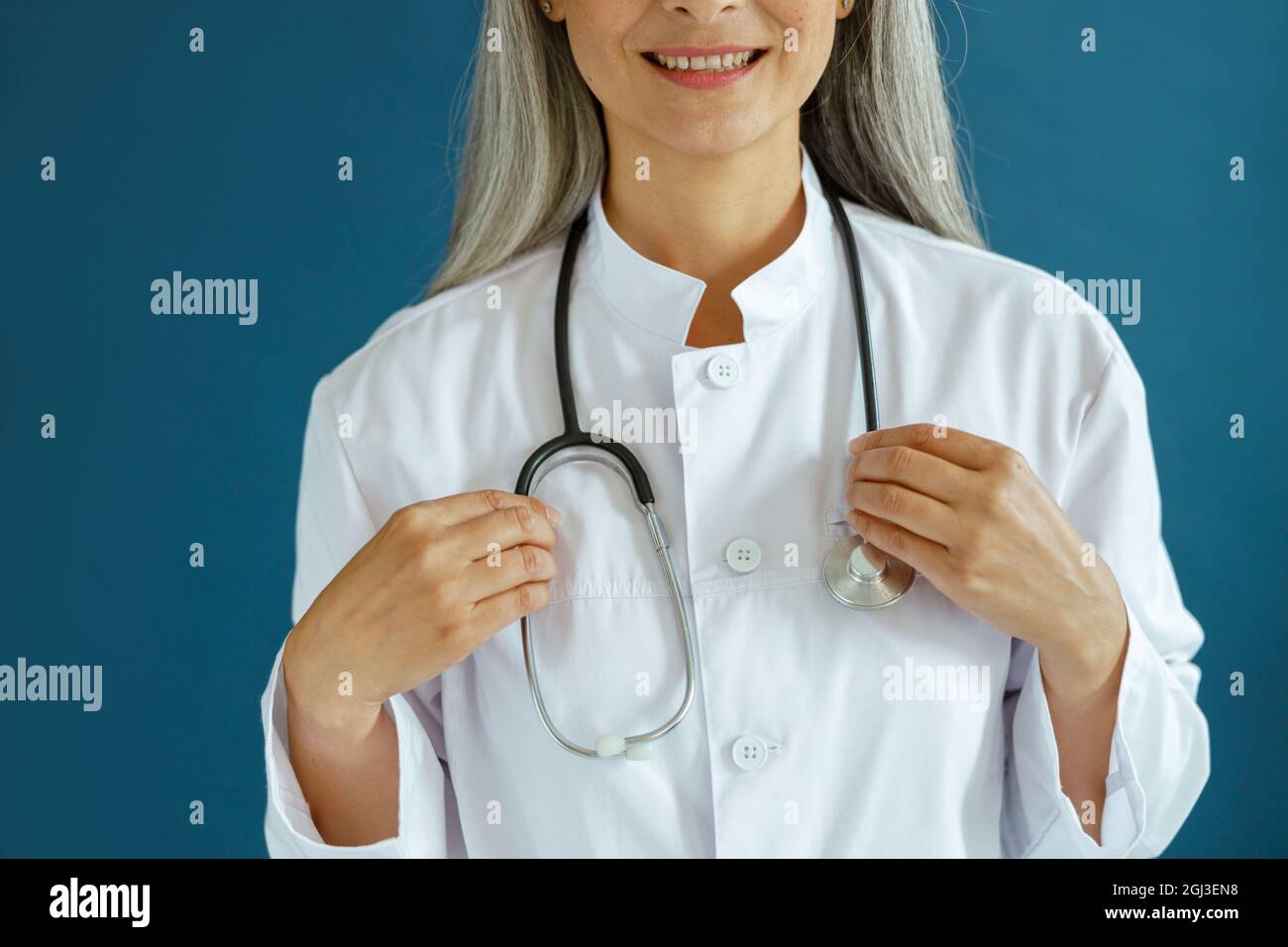 Mature asian doctor in hi-res stock photography and images - Alamy