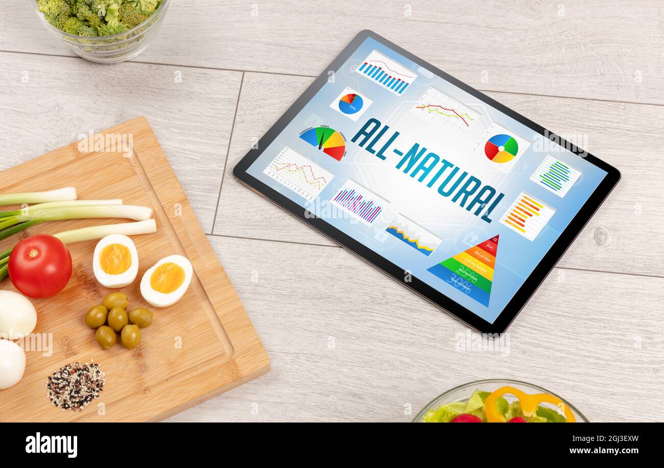 Organic food and tablet pc Stock Photo - Alamy