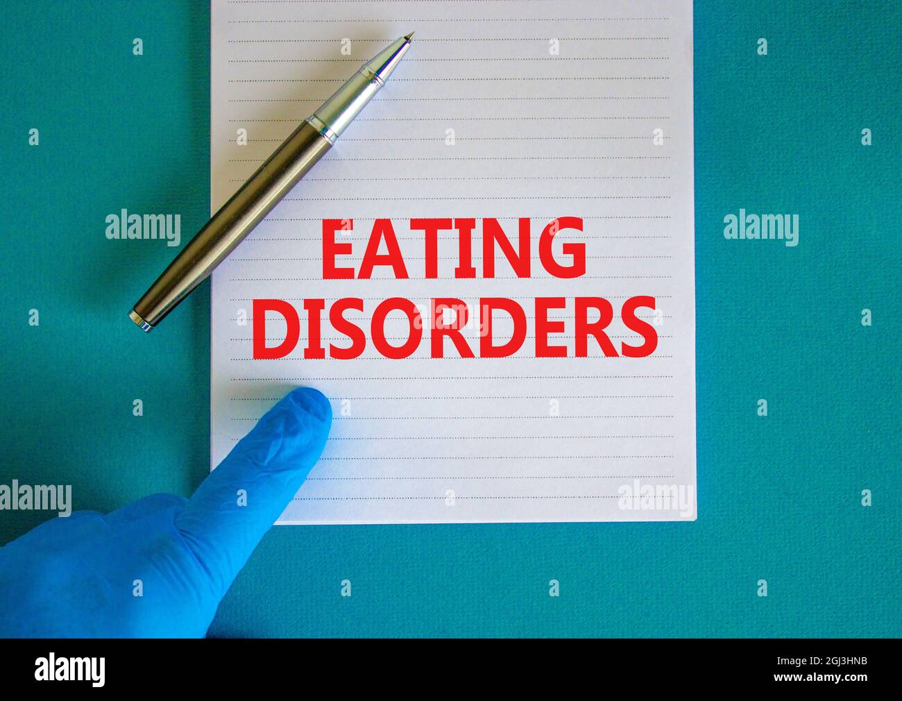 Eating disorders symbol. White note with words Eating disorders ...