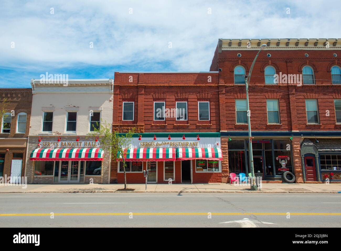 Historic sandstone and brick commercial buildings with Italianate style ...