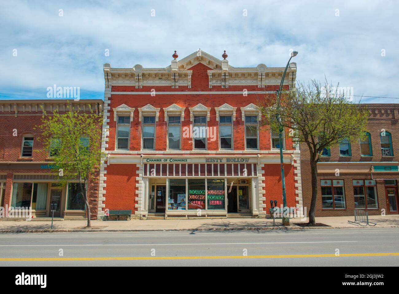 Historic sandstone and brick commercial buildings with Italianate style ...