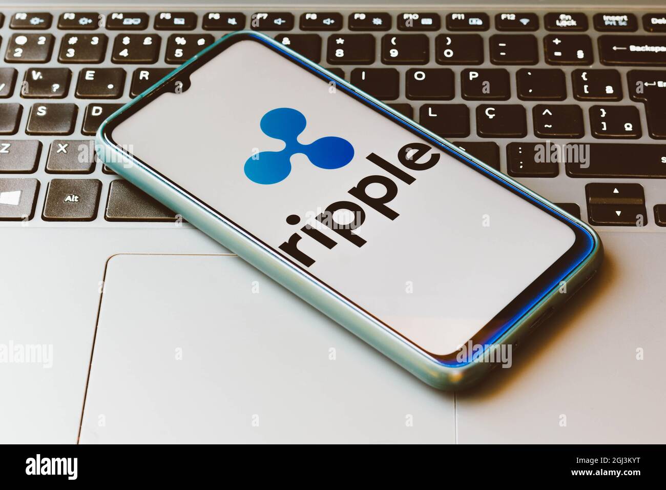 In this photo illustration the Ripple (XRP) logo seen displayed on a ...