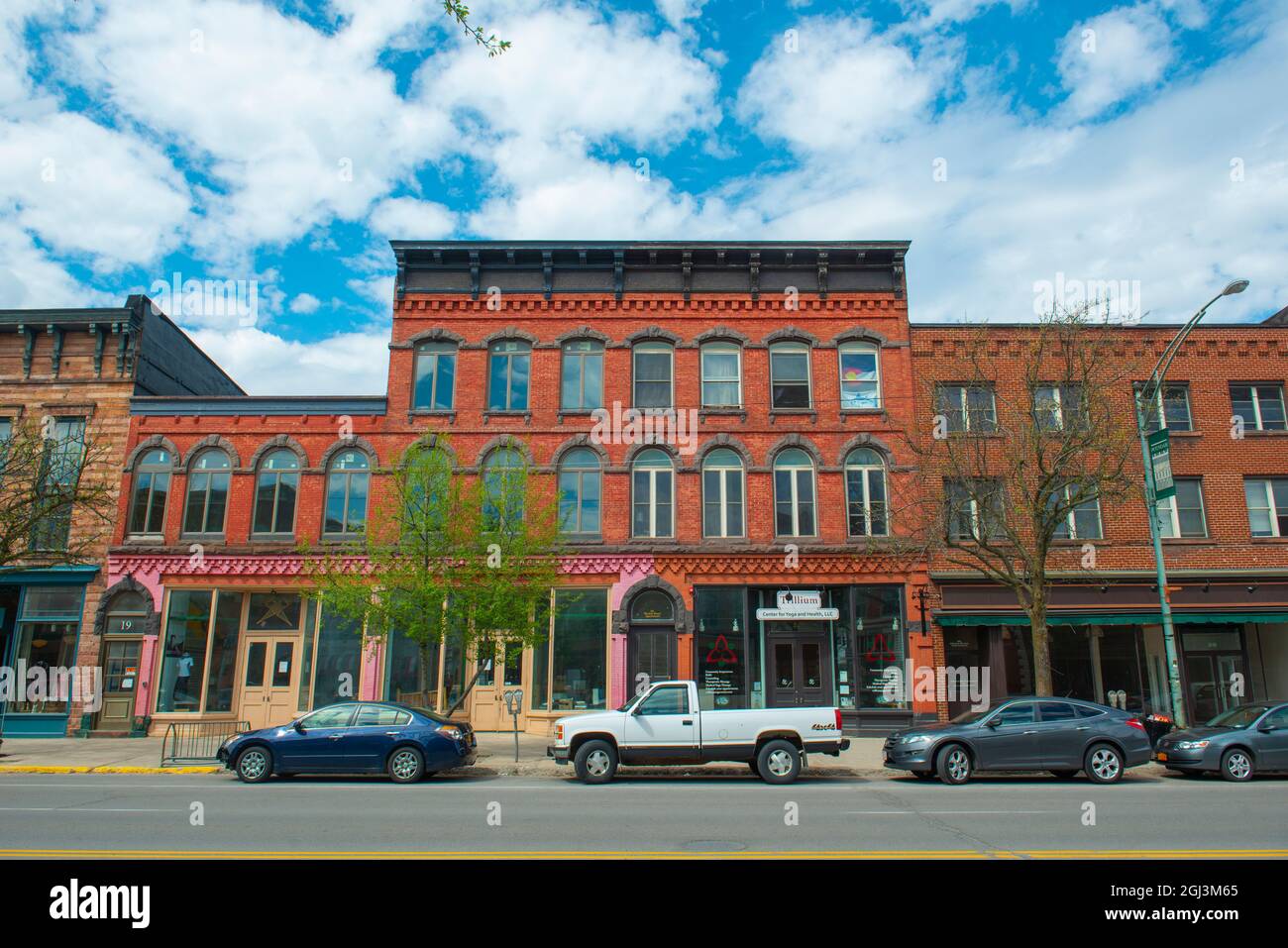 Historic sandstone and brick commercial buildings with Italianate style ...