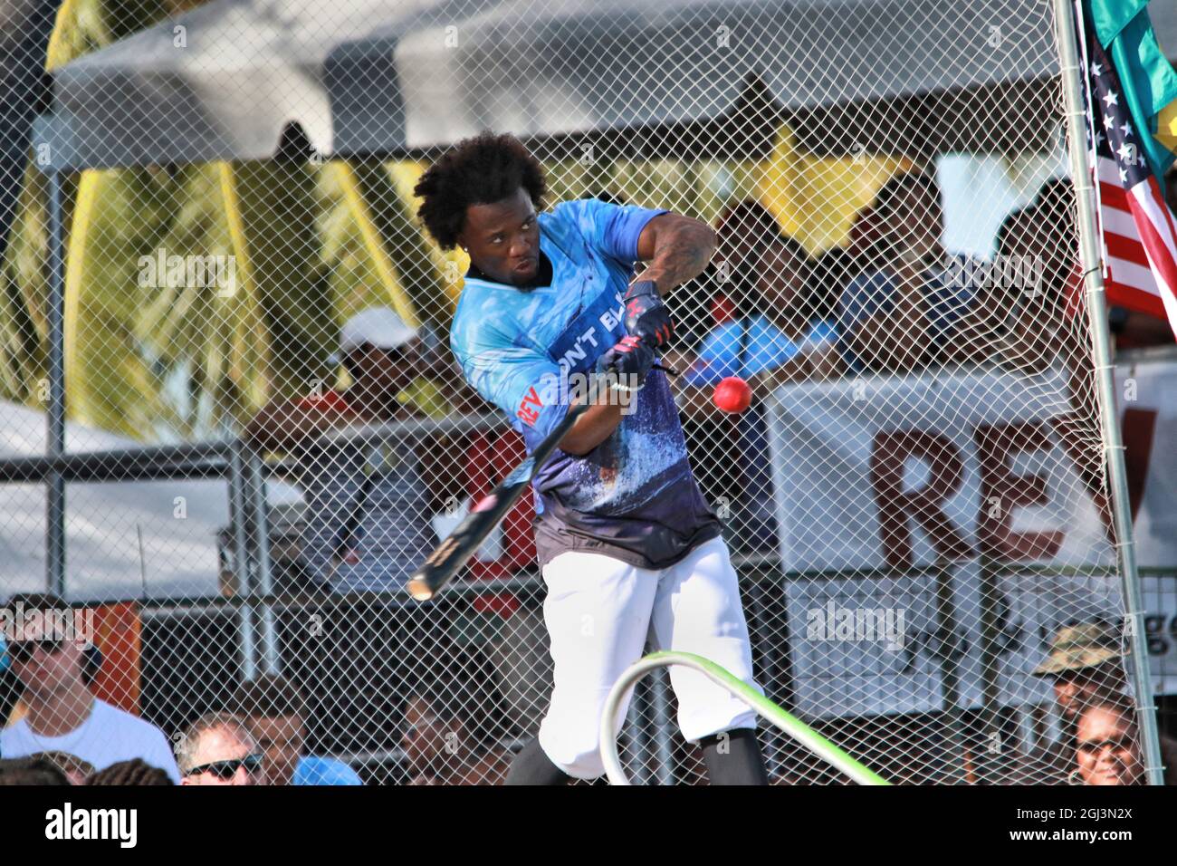 Base ball players hitting balls Stock Photo - Alamy