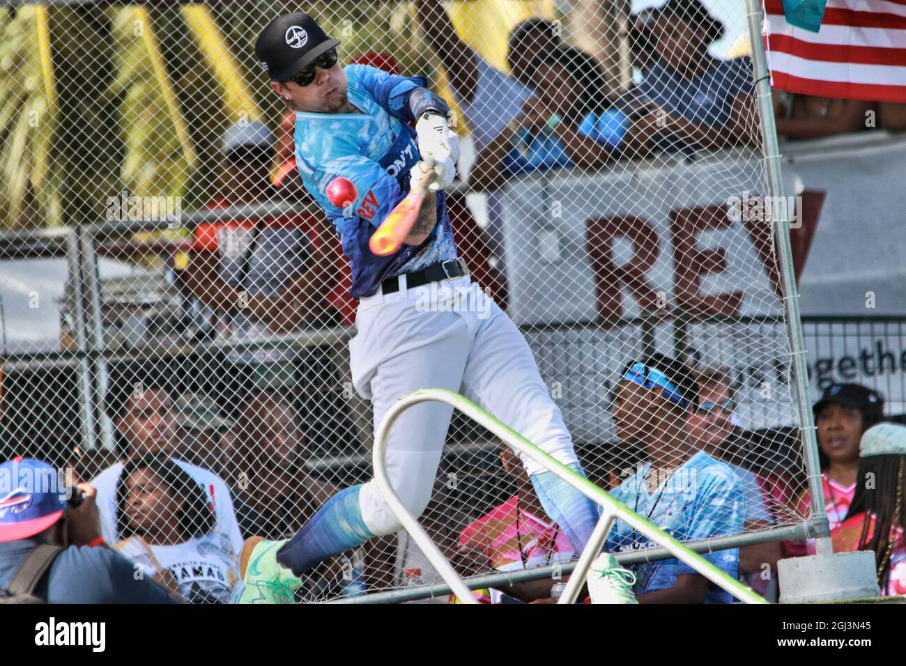 Base ball players hitting balls Stock Photo - Alamy