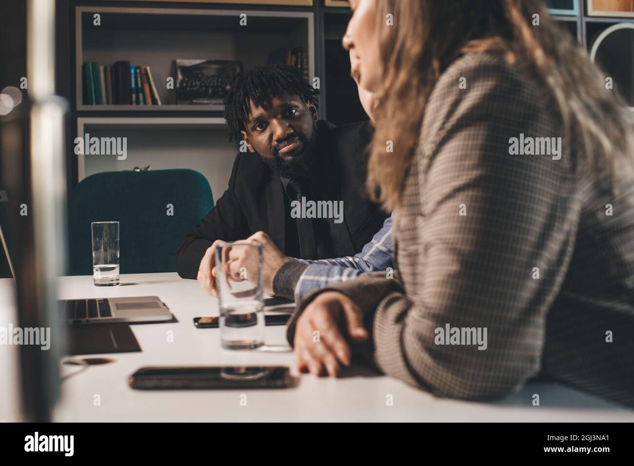 Team young developers discussing project hi-res stock photography and ...