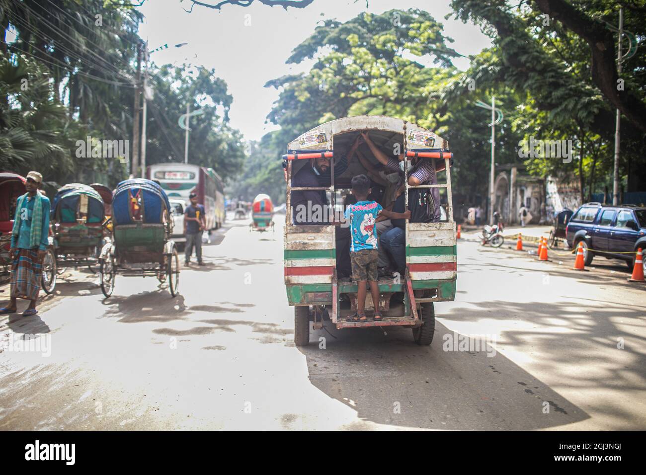 A young boy seen on a human hauler, he works as a helper and a ...