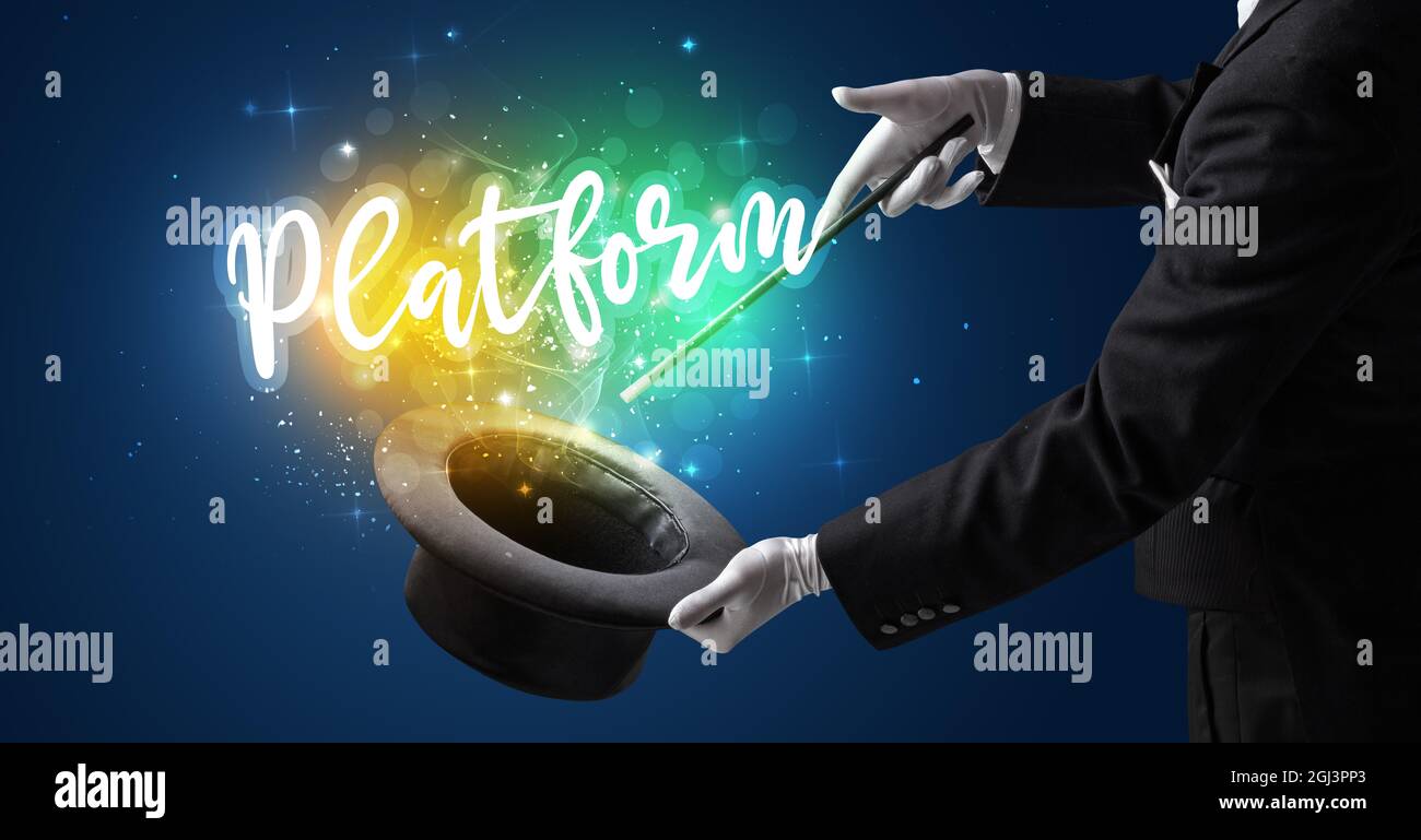 Young magician is showing magic trick Stock Photo - Alamy