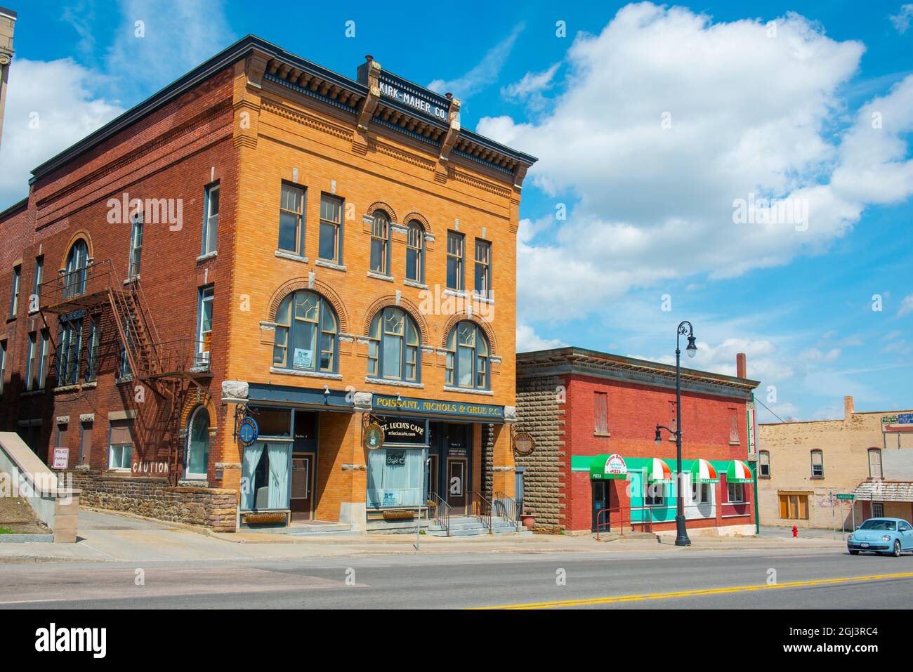 Historic sandstone and brick commercial buildings with Italianate style ...