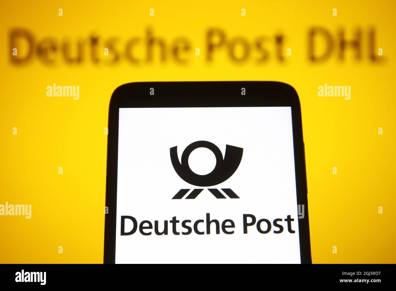 In this photo illustration a Deutsche Post AG and Deutsche Post DHL ...