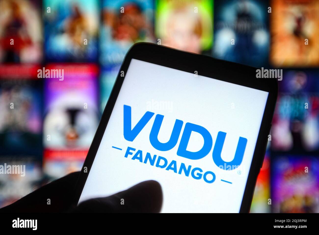 In this photo illustration a Vudu logo of a digital video store and ...