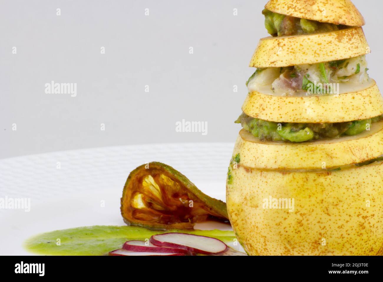 Gourmet Pear desert on a white background Stock Photo - Alamy