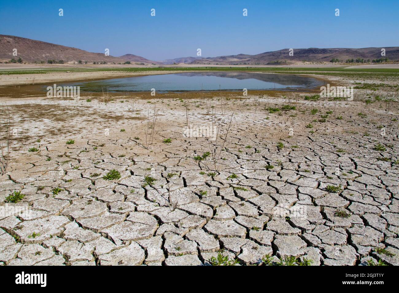 Little water remaining in a drying lake bed. Nevada continues to suffer ...