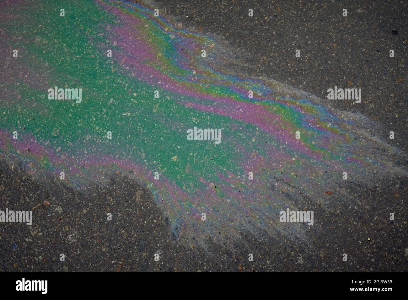 Oil stain on Asphalt, color Gasoline fuel spots on Asphalt Road as ...