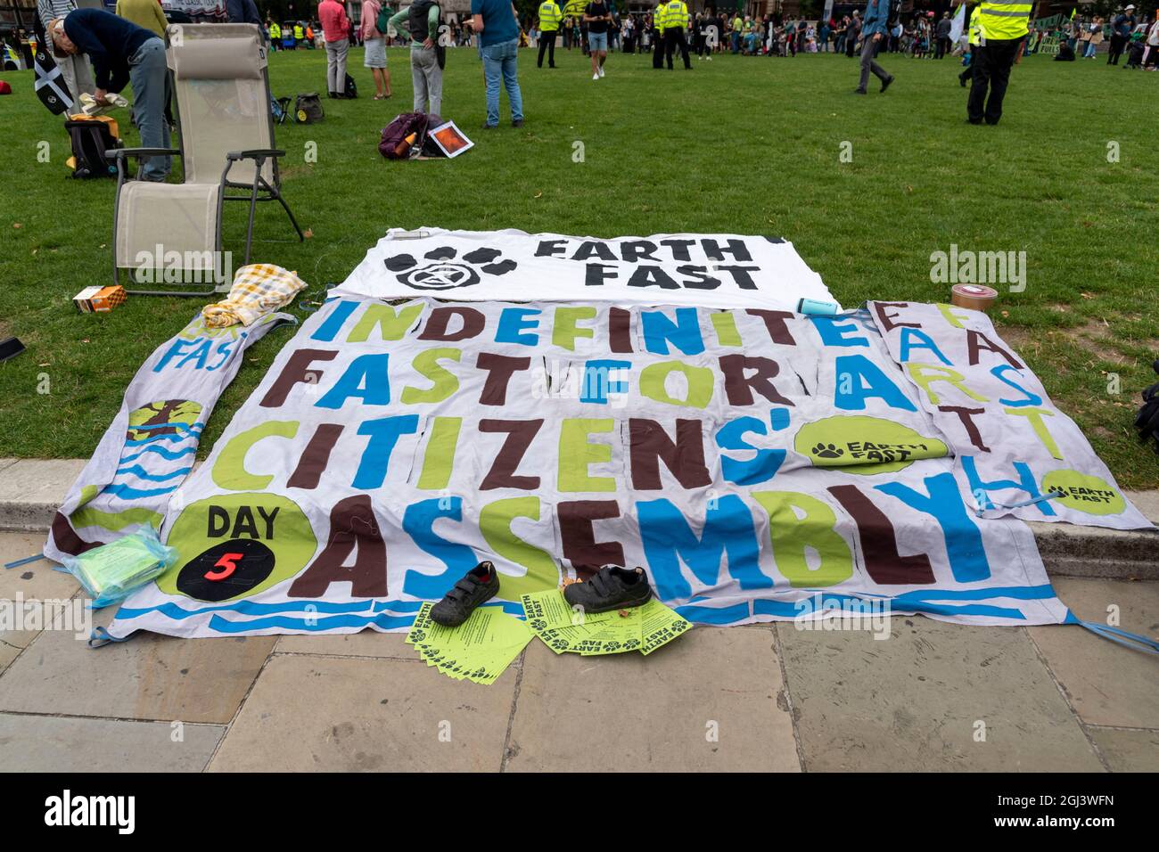 A banner for Extinction Rebellion’s Earth Fast in Parliament Square ...