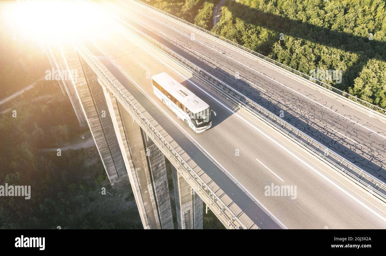a bus full of passengers moving on the highway Stock Photo - Alamy