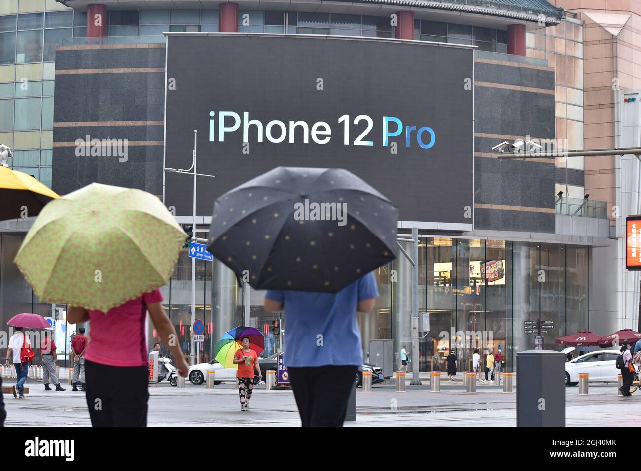 An iPhone 12 Pro logo seen displayed on a large screen outside the ...