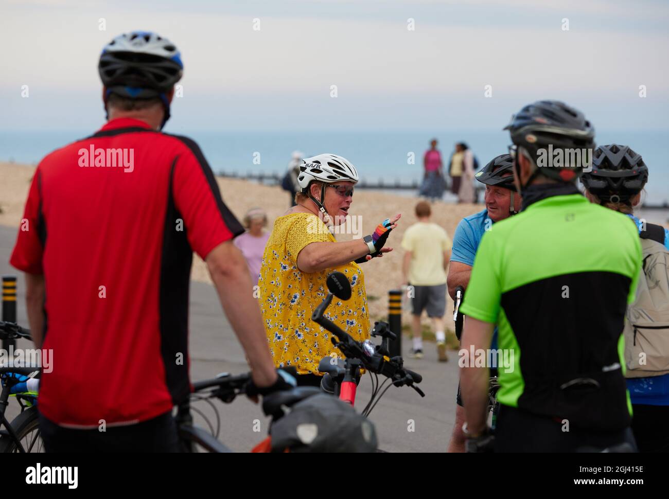 Friends preparing for a cycle ride Stock Photo - Alamy