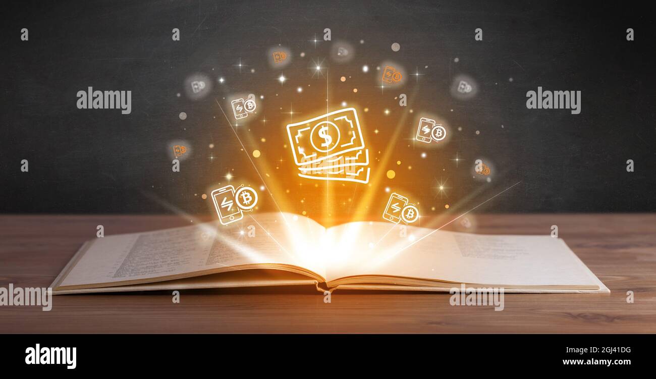 Open book with currency icons above Stock Photo - Alamy