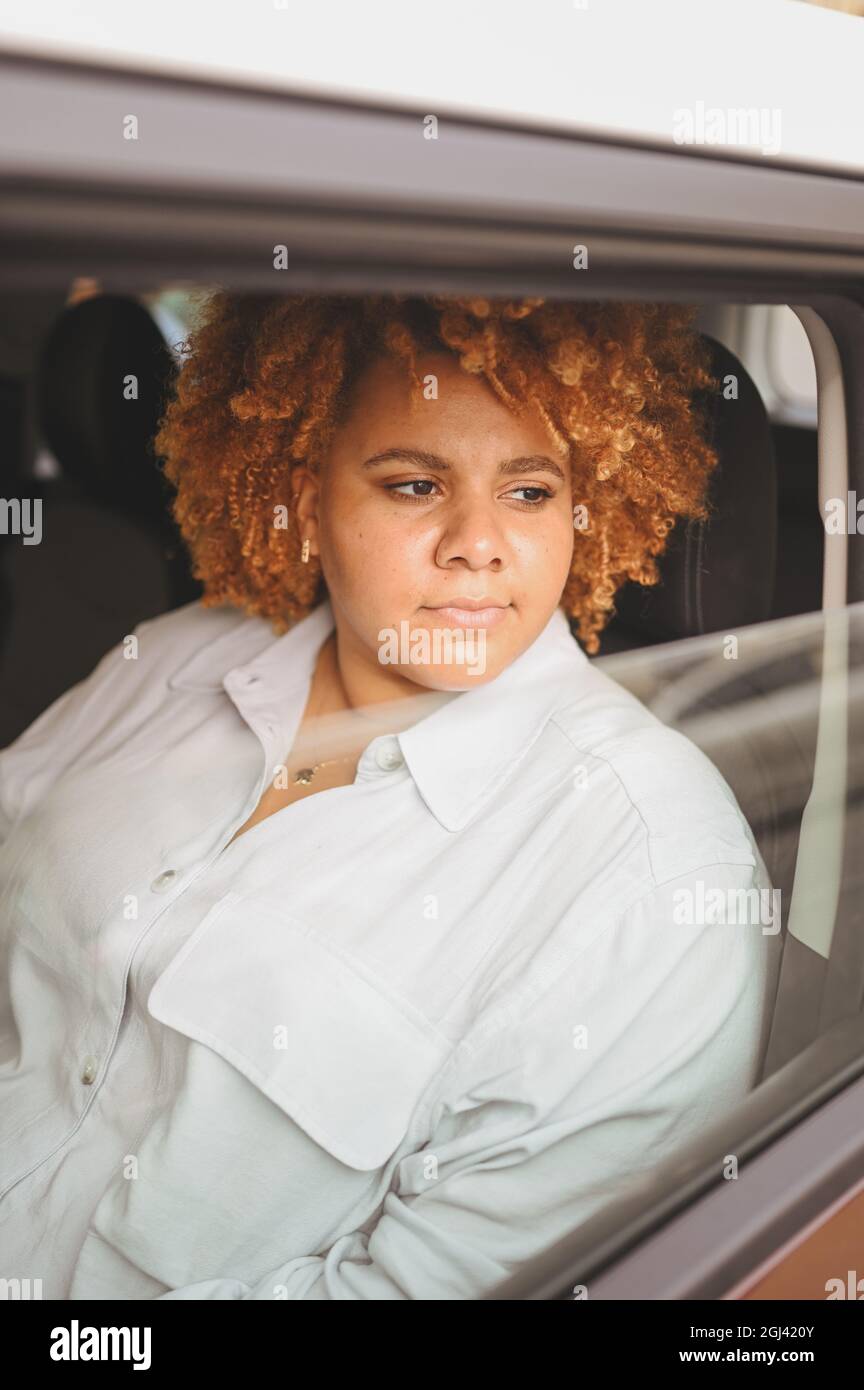 Happy african female driver inside car hi-res stock photography and ...
