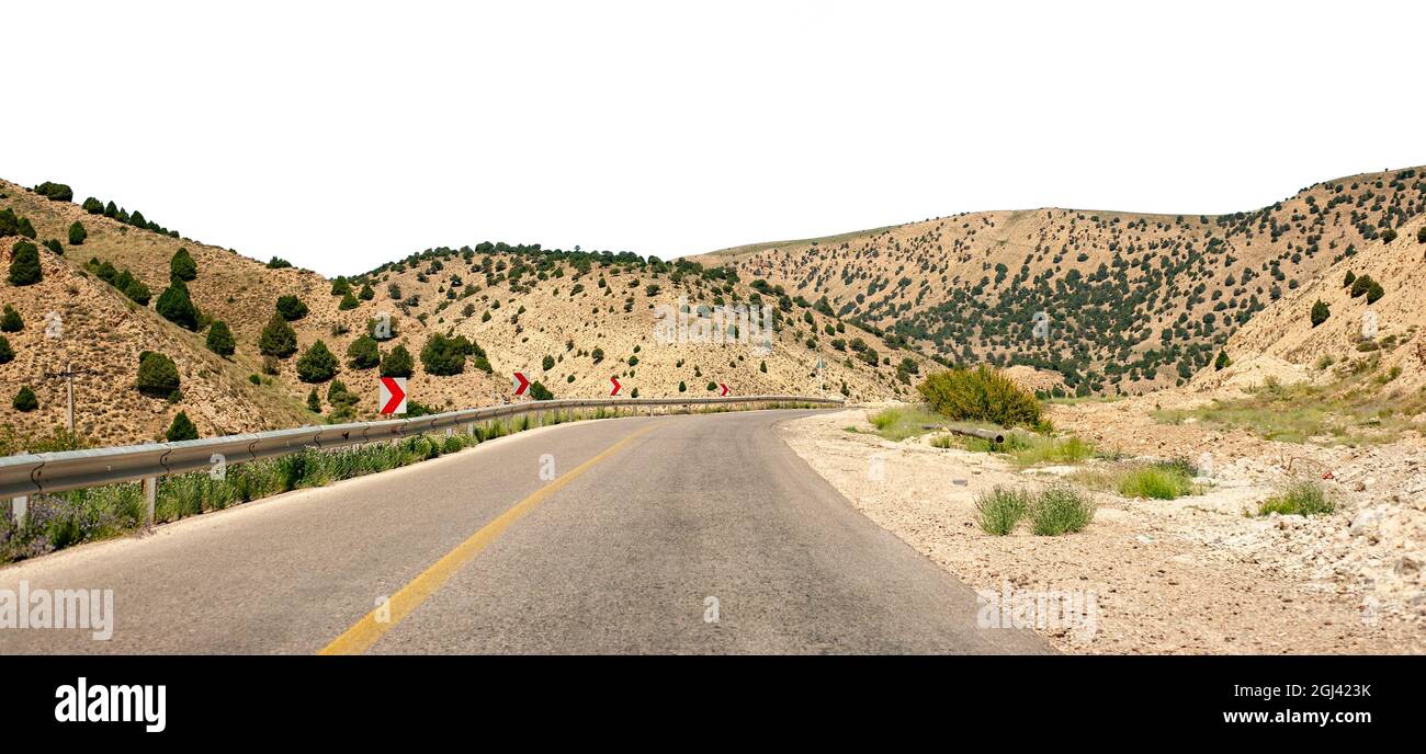 Mountains with some trees and countryside road isolated on white ...