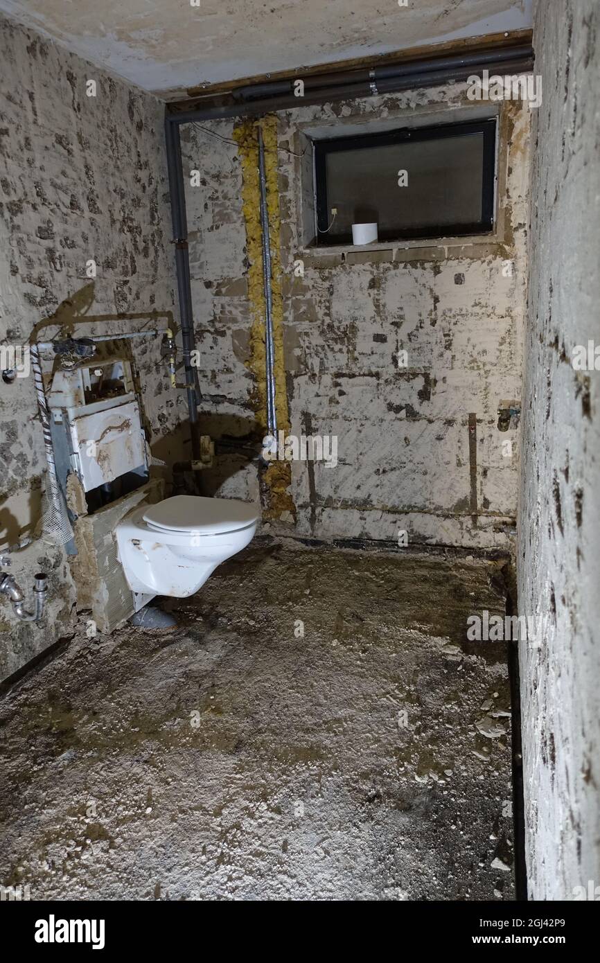 Demolition work in the basement of a residential building after the ...