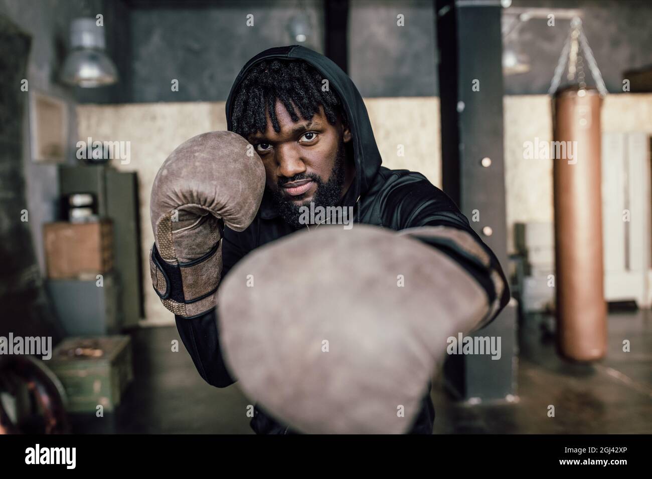 black boxer. Punch to the camera, close-up Stock Photo - Alamy