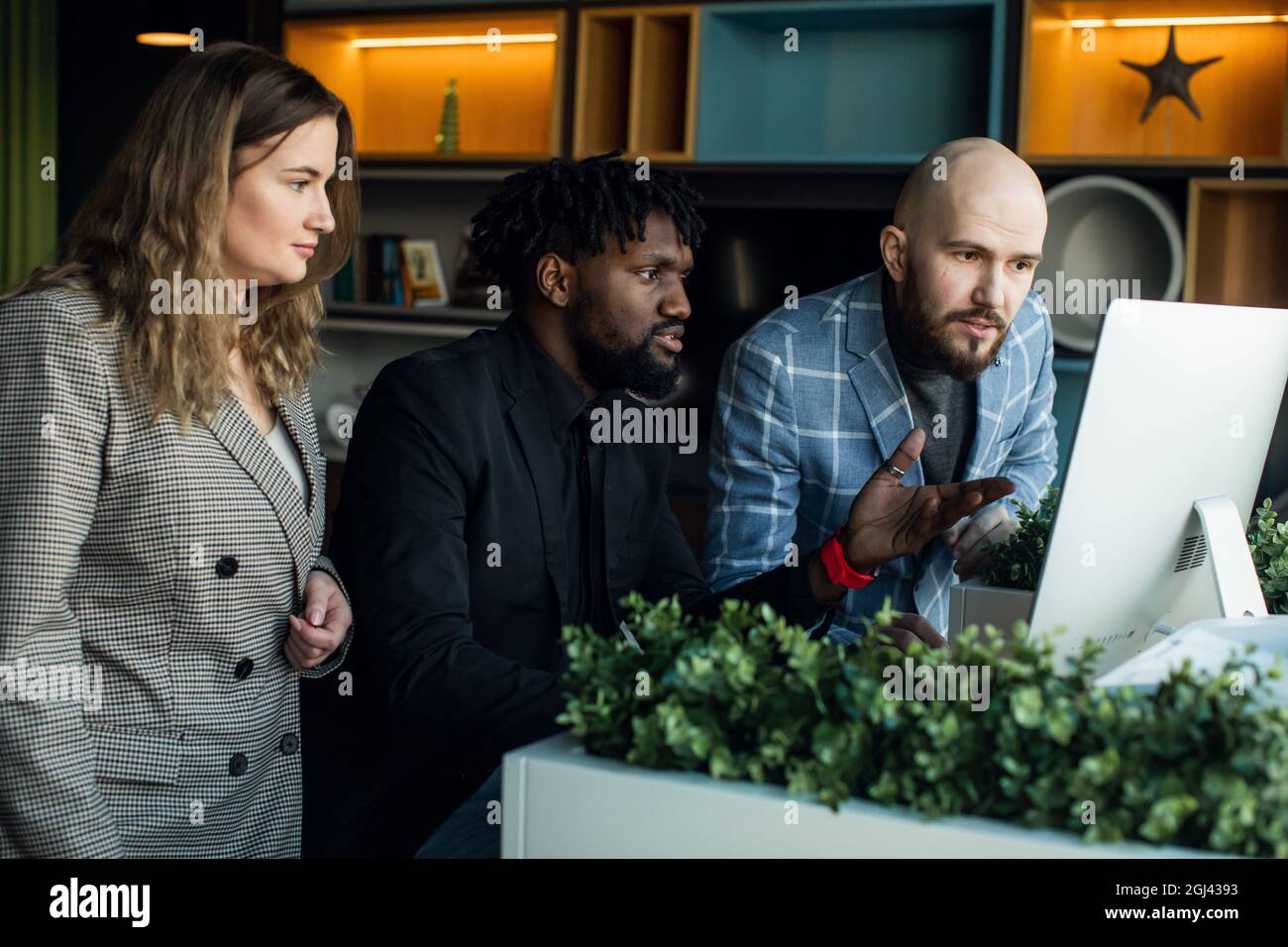 young team leader black man brainstorming with businessman colleague ...