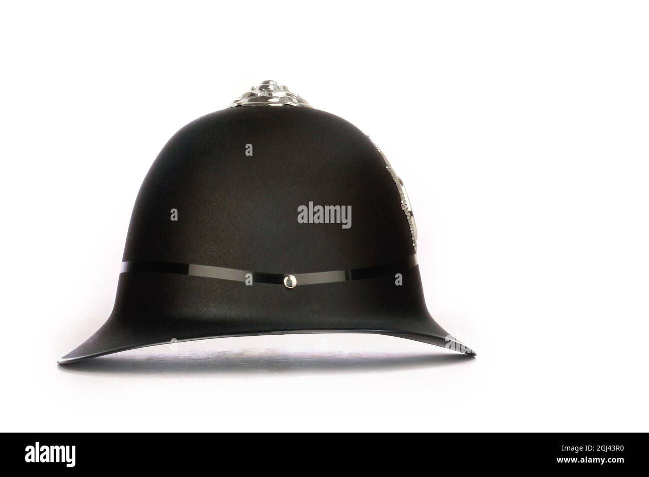 Traditional British police helmet isolated on a white background Stock ...