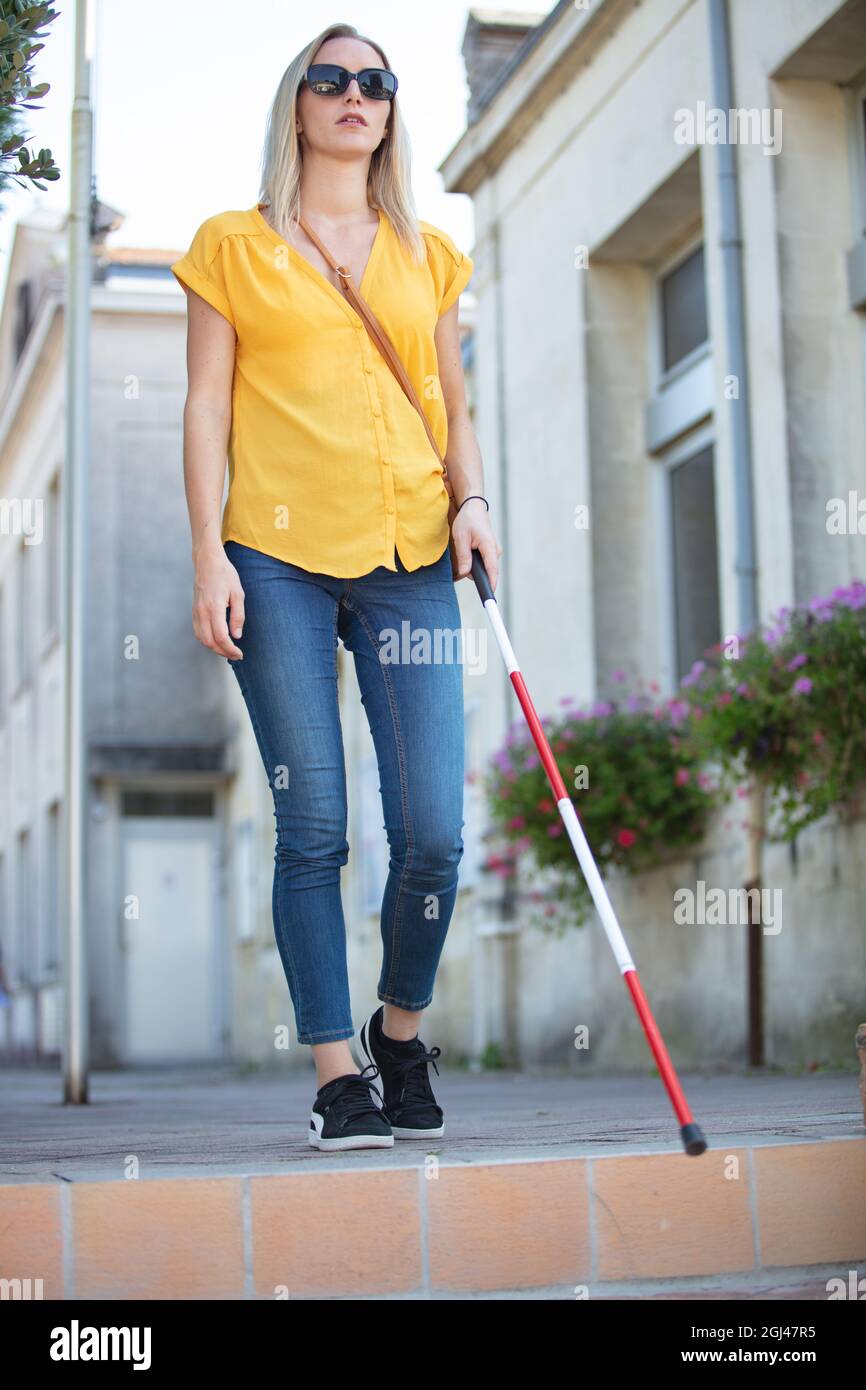 blind woman crossing the street Stock Photo - Alamy