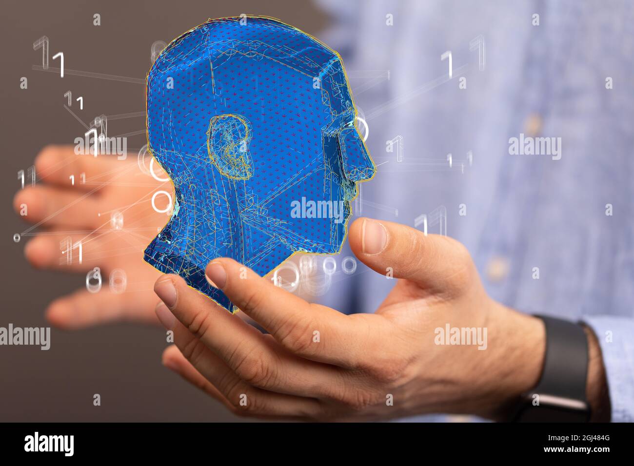 3D render of a human head floating above a Caucasian man's hands ...
