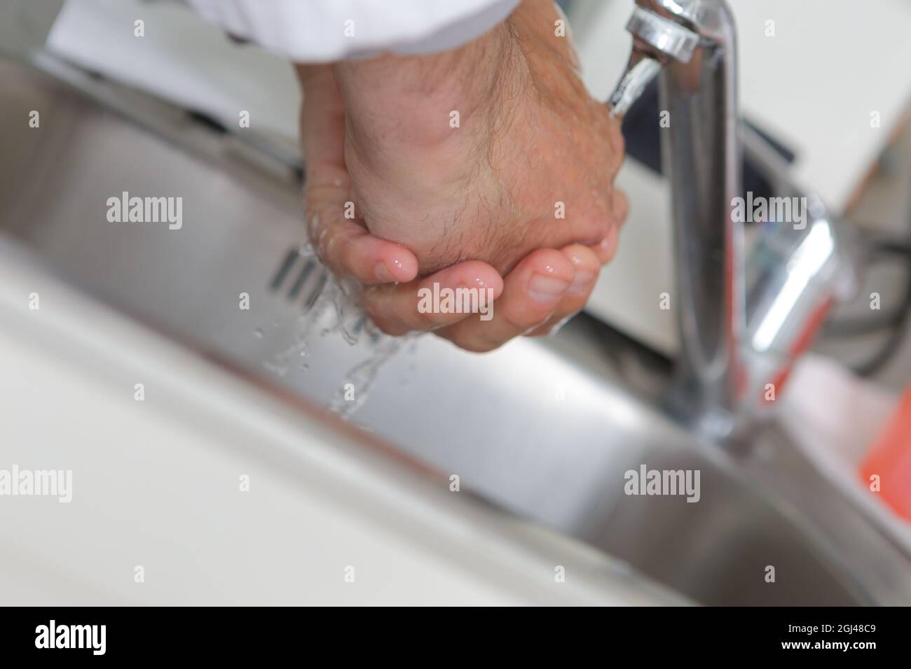 a photo of hand washing Stock Photo - Alamy