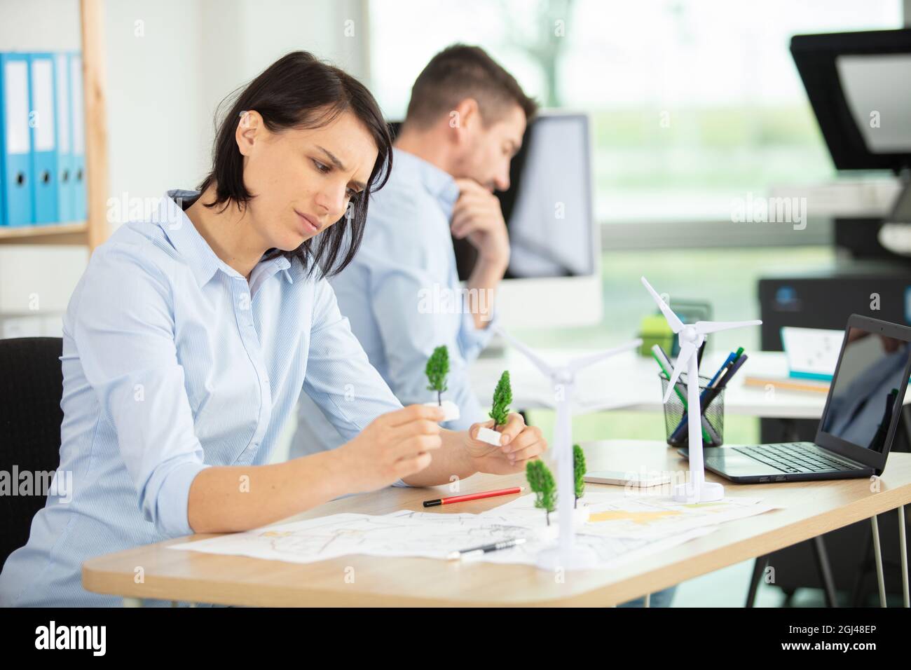 busy design office with workers at desks Stock Photo - Alamy