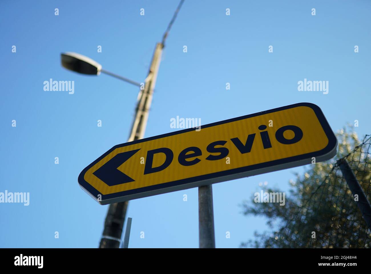 Selective of a deviation sign on the road Stock Photo - Alamy