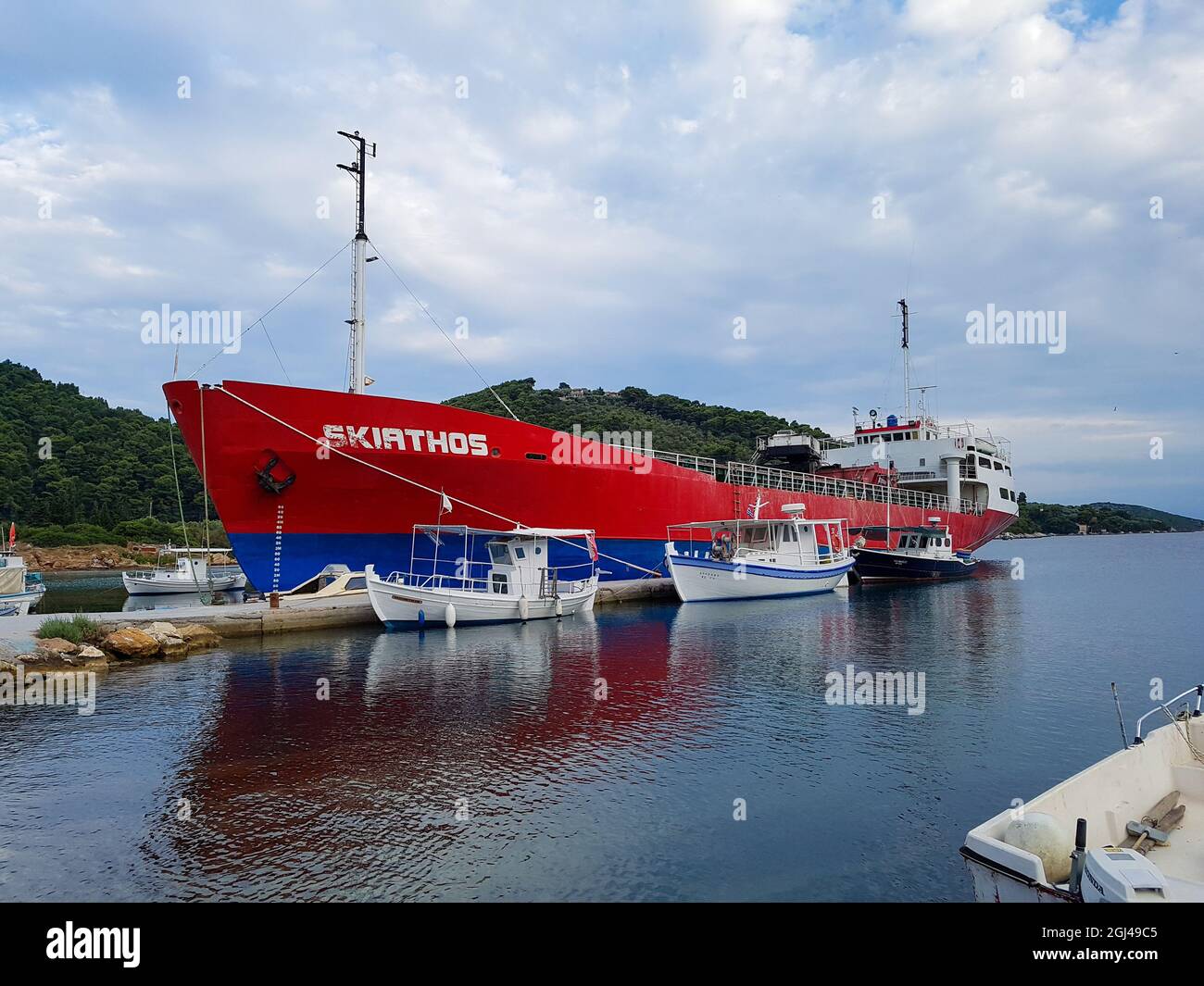 Brightly coloured ship parked at Skiathos Stock Photo - Alamy